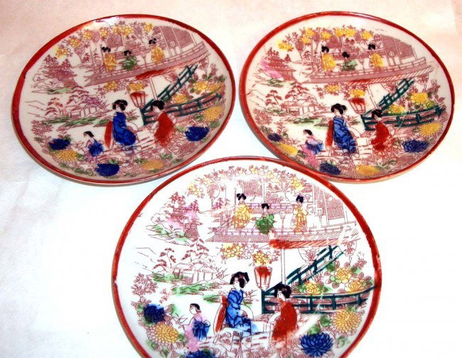 Three antique porcelain Japanese Geisha dishes