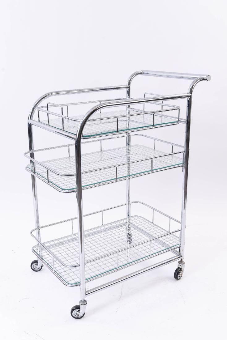 A VINTAGE ROLLING SERVING CART WITH WAGON WHEELS