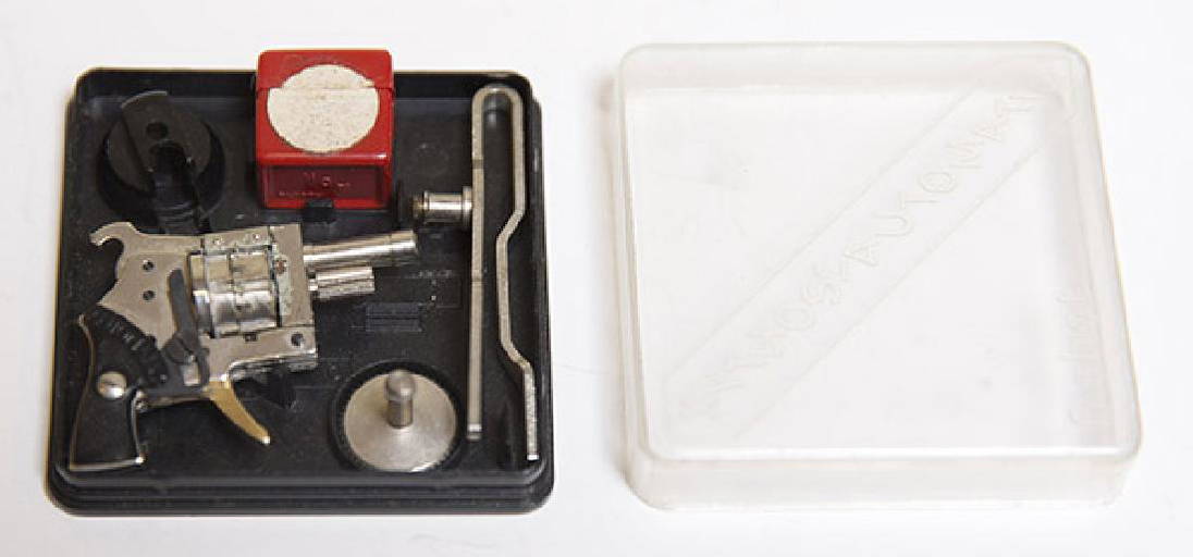 Xythos Automatic 6 Shot Miniature Gun