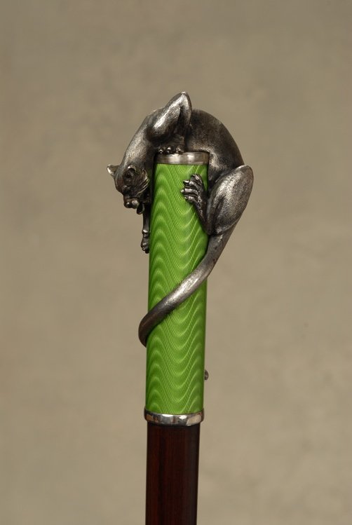 A fabulous silver panther on green enamel cane