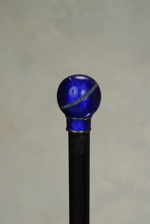 A lovely blue enamel ball cane with guilloche