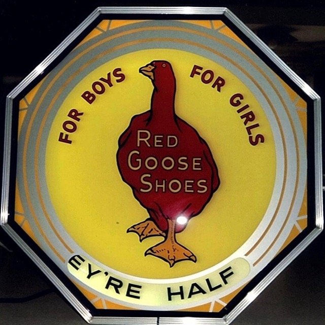 Red Goose Shoe's Neon Rotating Advertising Sign