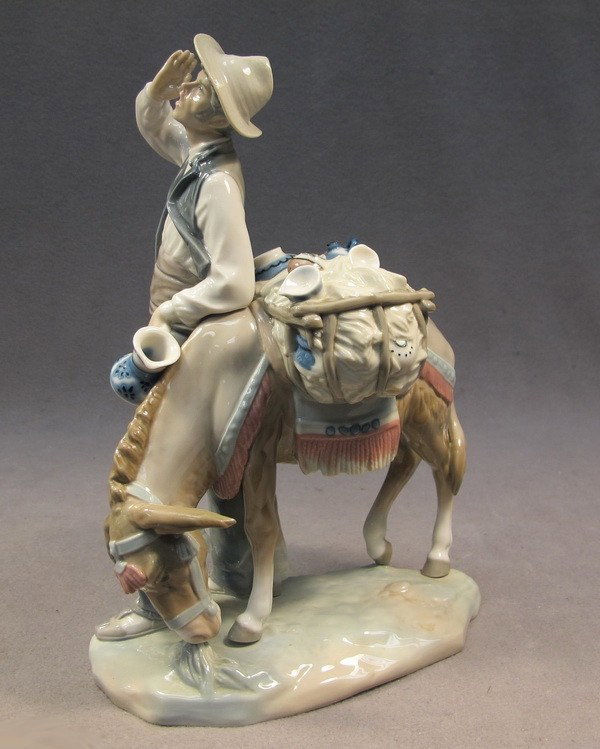 299: Spanish Lladro man & donkey porcelain statue