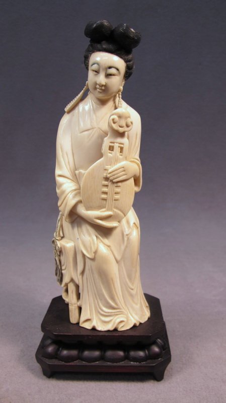 Oriental carved ivory statue