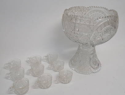 A Cut Crystal Punch Bowl And Stand