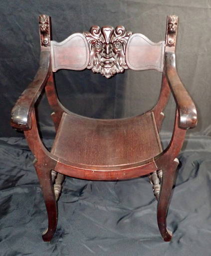 Carved Mahogany Green Man Saddle Chair