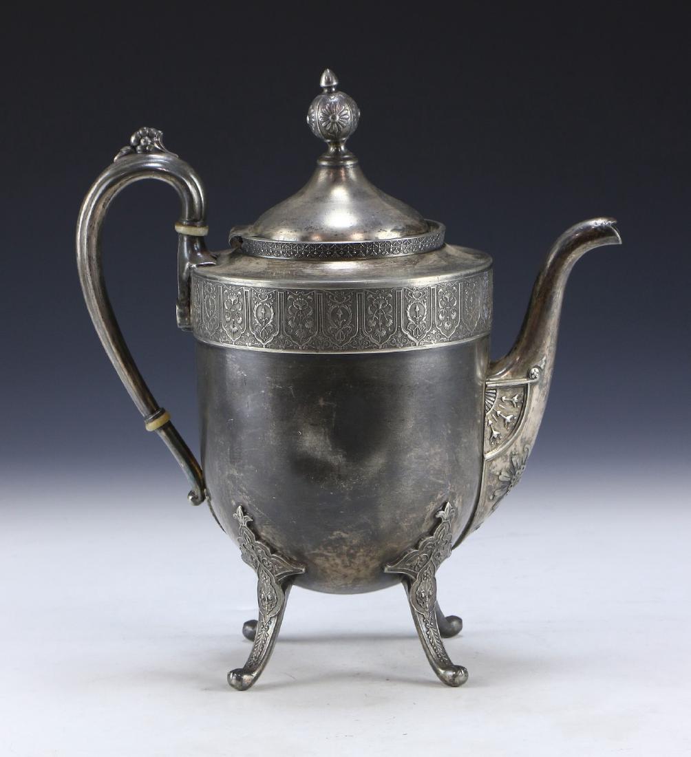 A REED & BARTON ANTIQUE SILVER PLATED TEAPOT