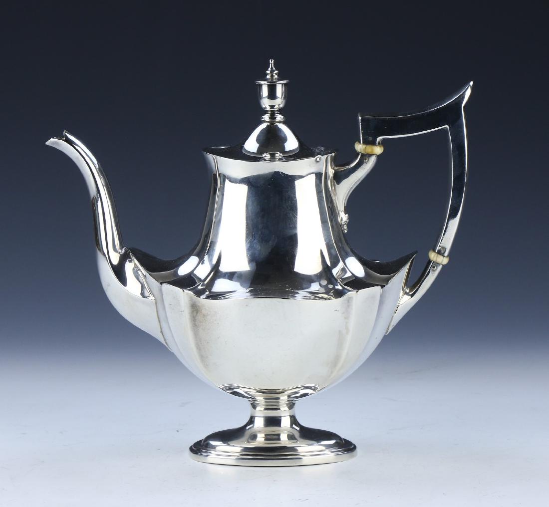 A 1912 GORHAM STERLING SILVER COLONIAL STYLE TEAPOT