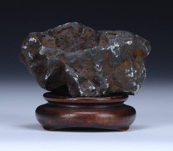 A Meteorite Boulder With Stand