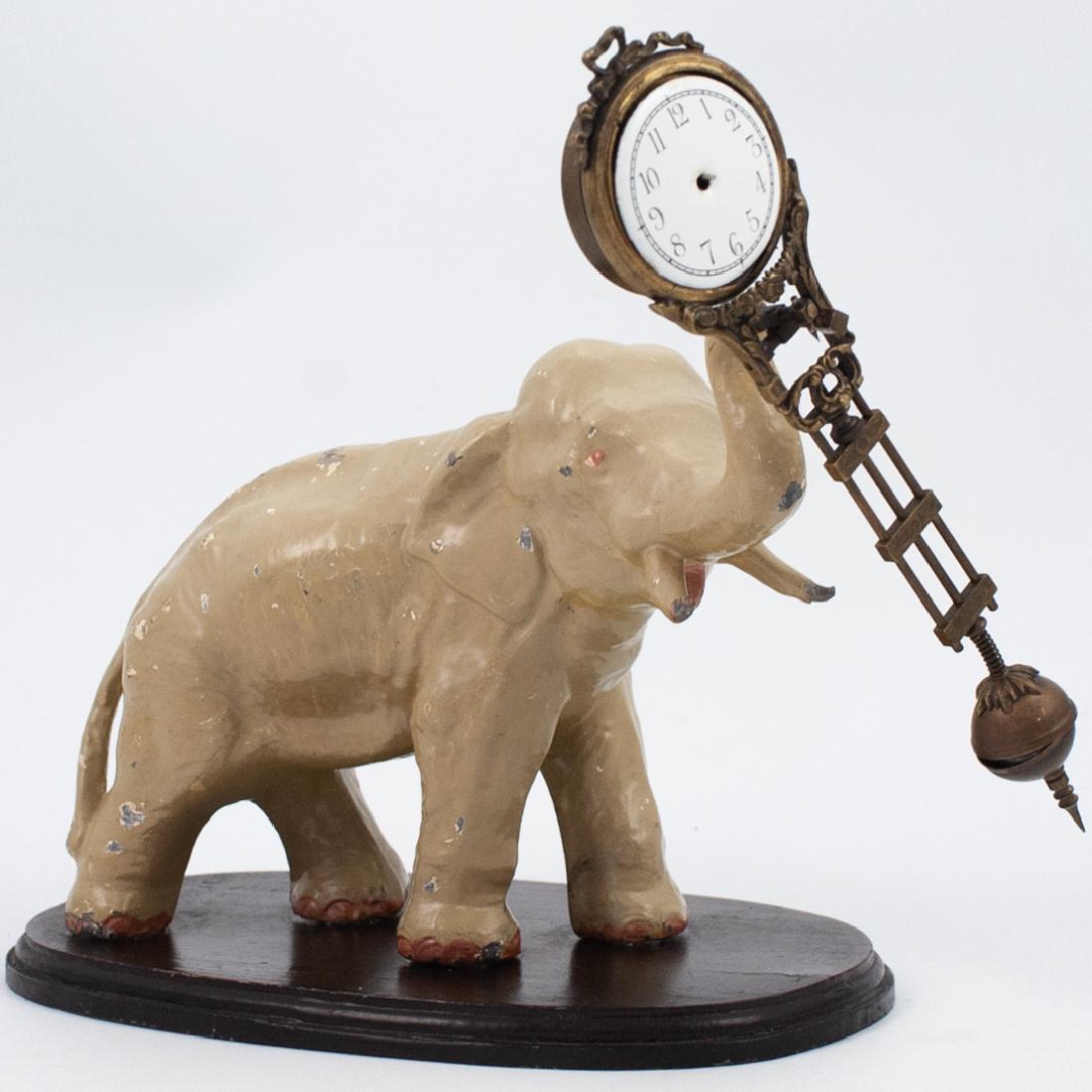Figural Elephant Swinging Clock