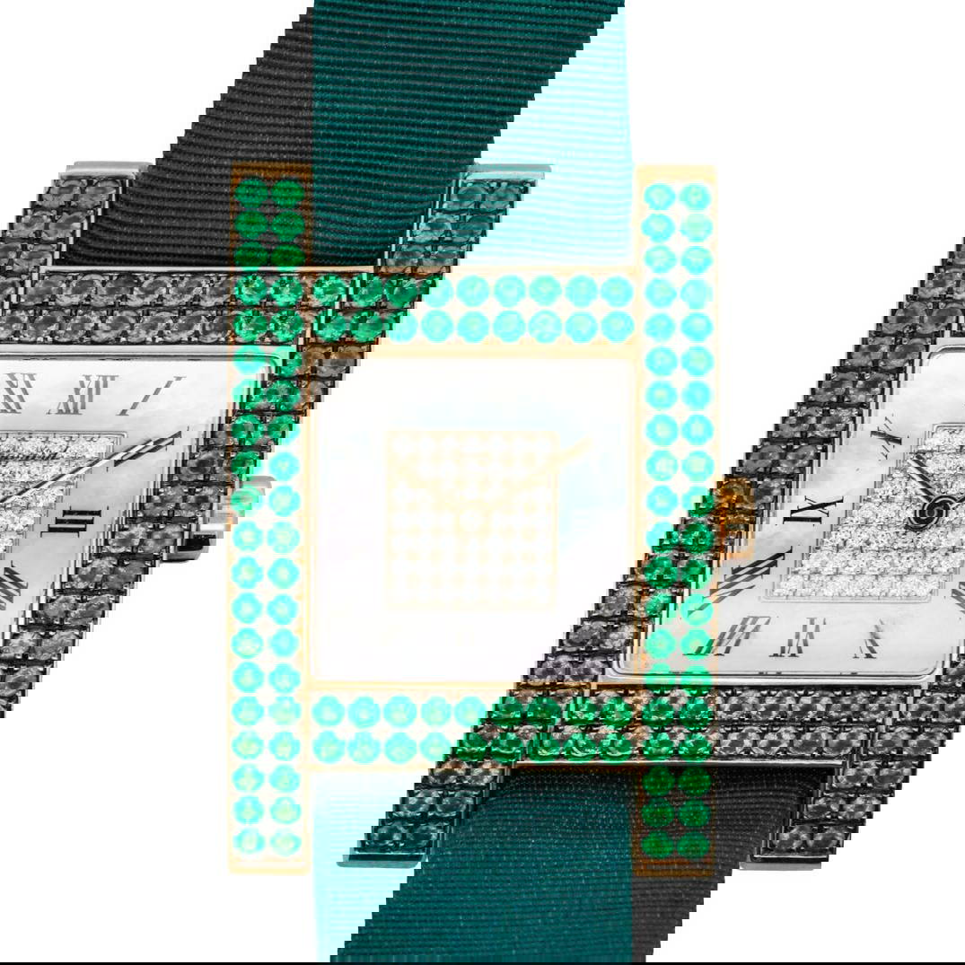 Rare Chopard 18k Gold, Mop, And Emerald Watch Auction