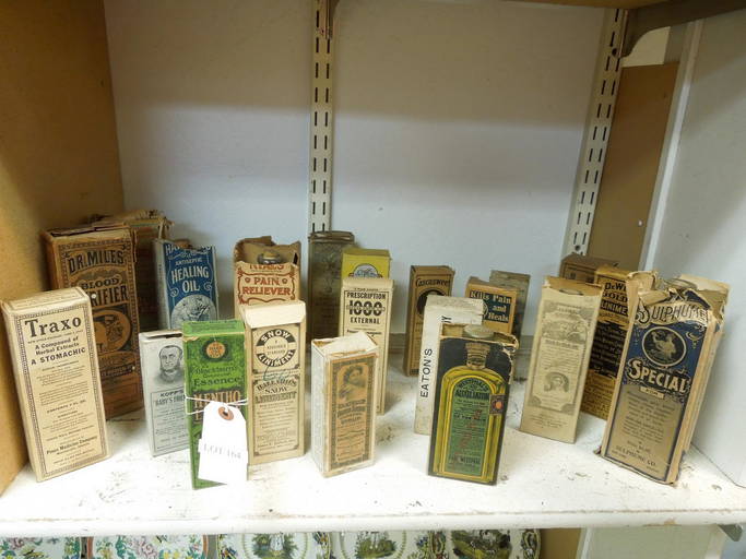 Group Of Vintage Quack Medicine Bottles In Boxes.