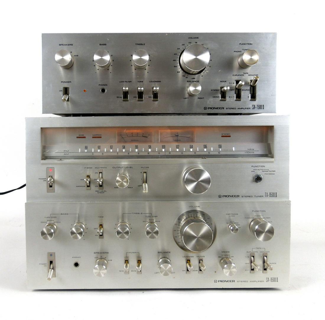Two Pioneer Amplifiers And A Tuner.