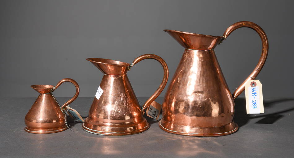 3 Polished Copper Graduated Pitchers