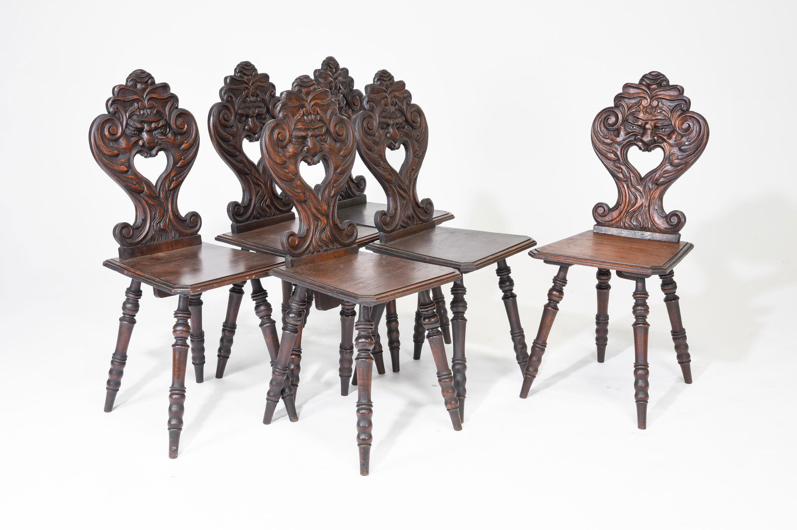 Set Of 6 Carved Oak North Wind Chairs