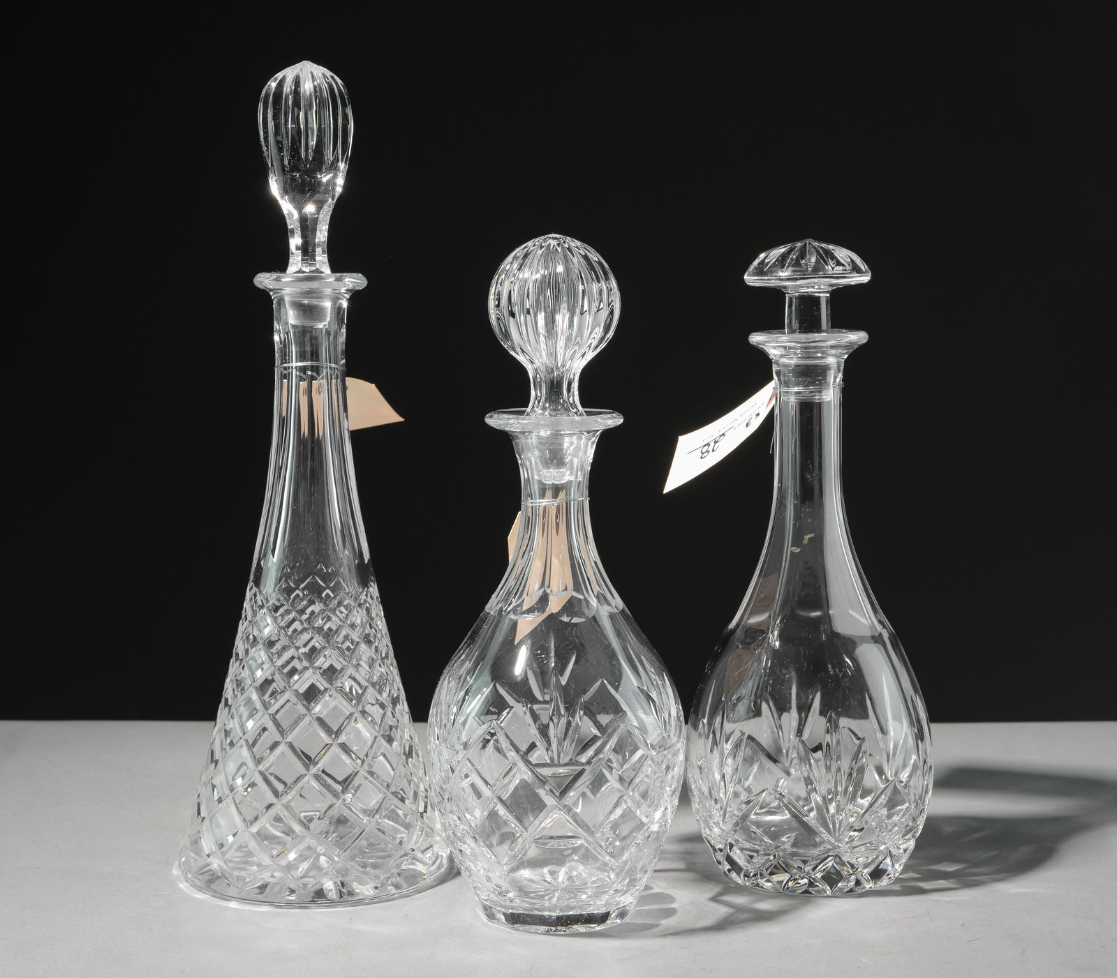 Three Assorted Cut Glass Crystal Decanters Auction