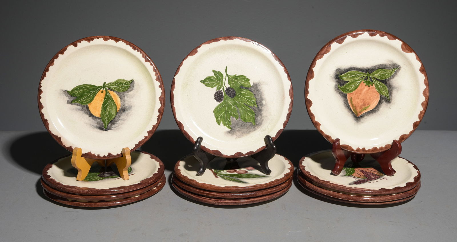 12 Assorted Hand Painted Pottery Plates Auction