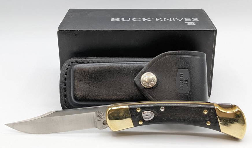 Nib Buck 110 Switchblade W/ Brass Hardware