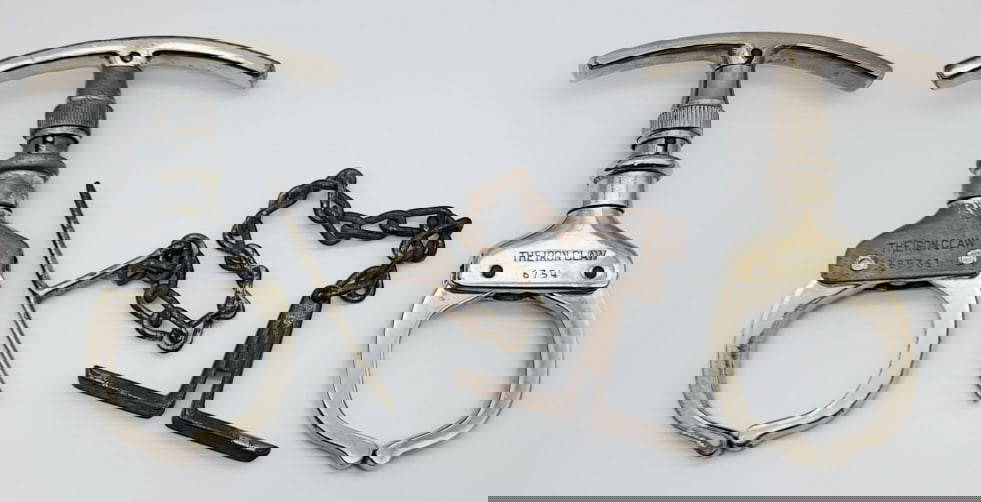 Pair Of Iron Claw Handcuff Nippers & Chain Twister Auction