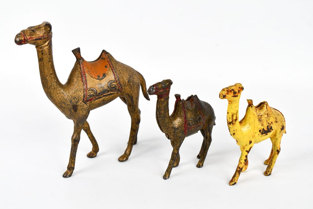 (3) Cast Iron Camel Coin Banks Auction