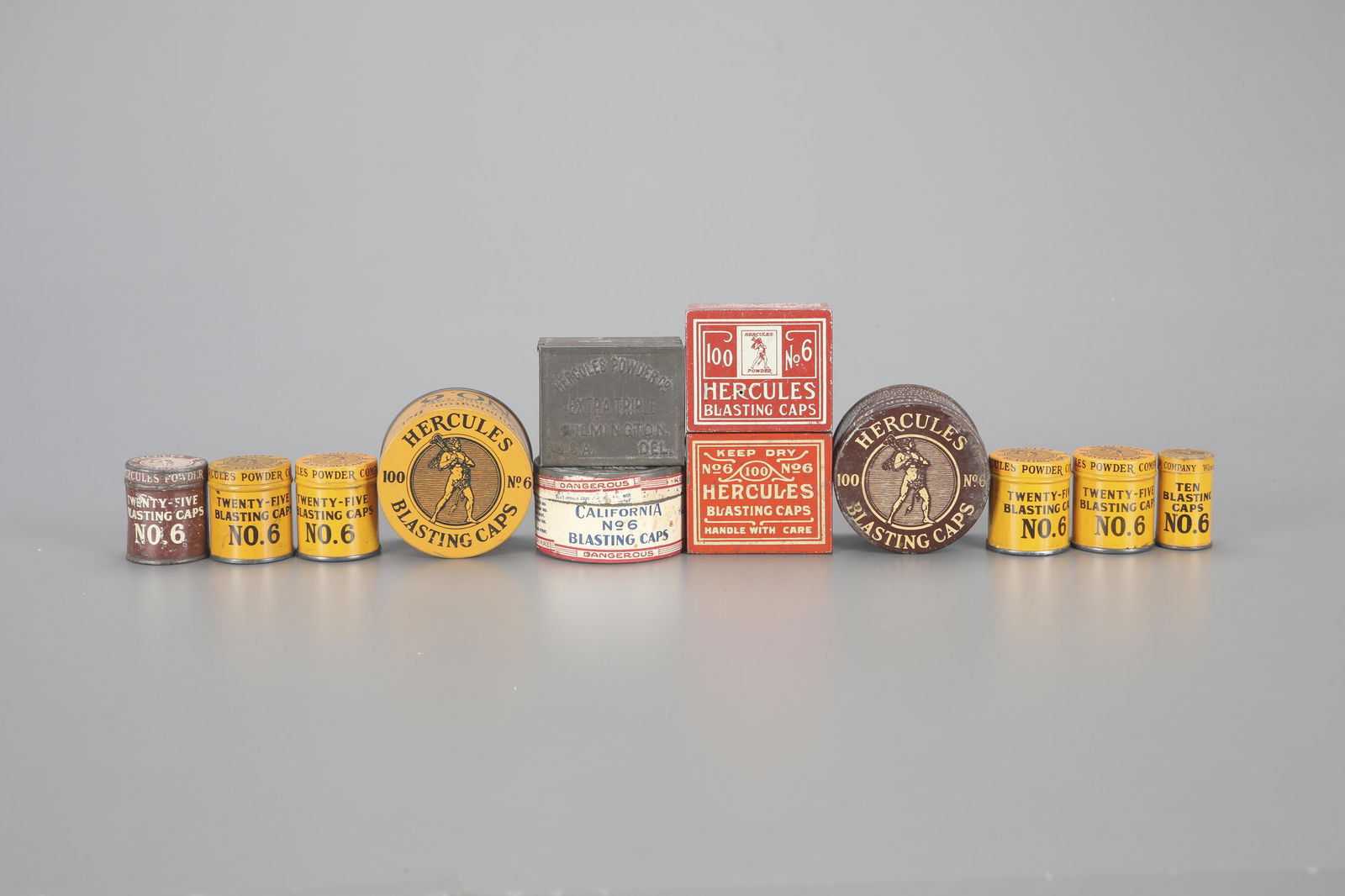 Twelve Hercules Blasting Cap Containers