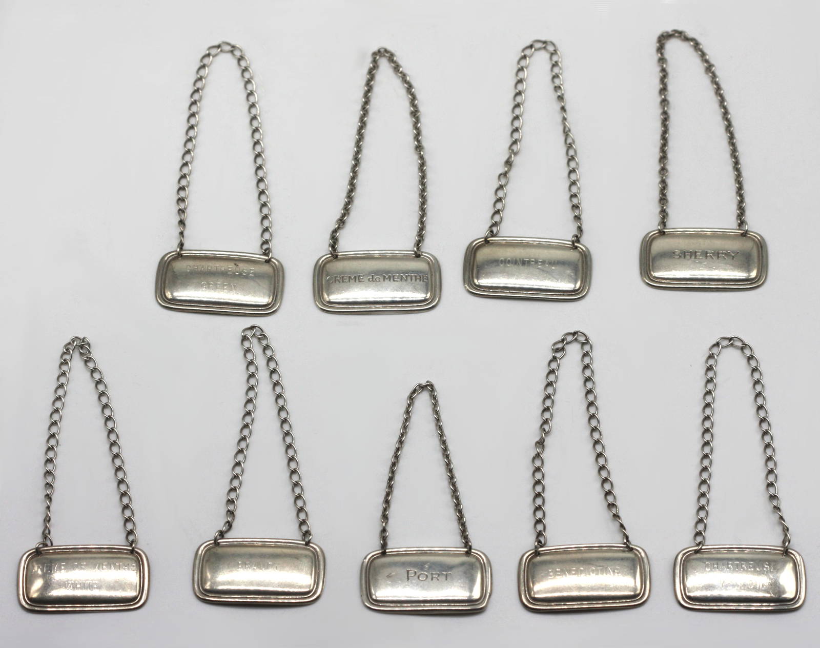 Set Of Eight Tiffany & Co. Sterling Silver Decanter Labels Auction