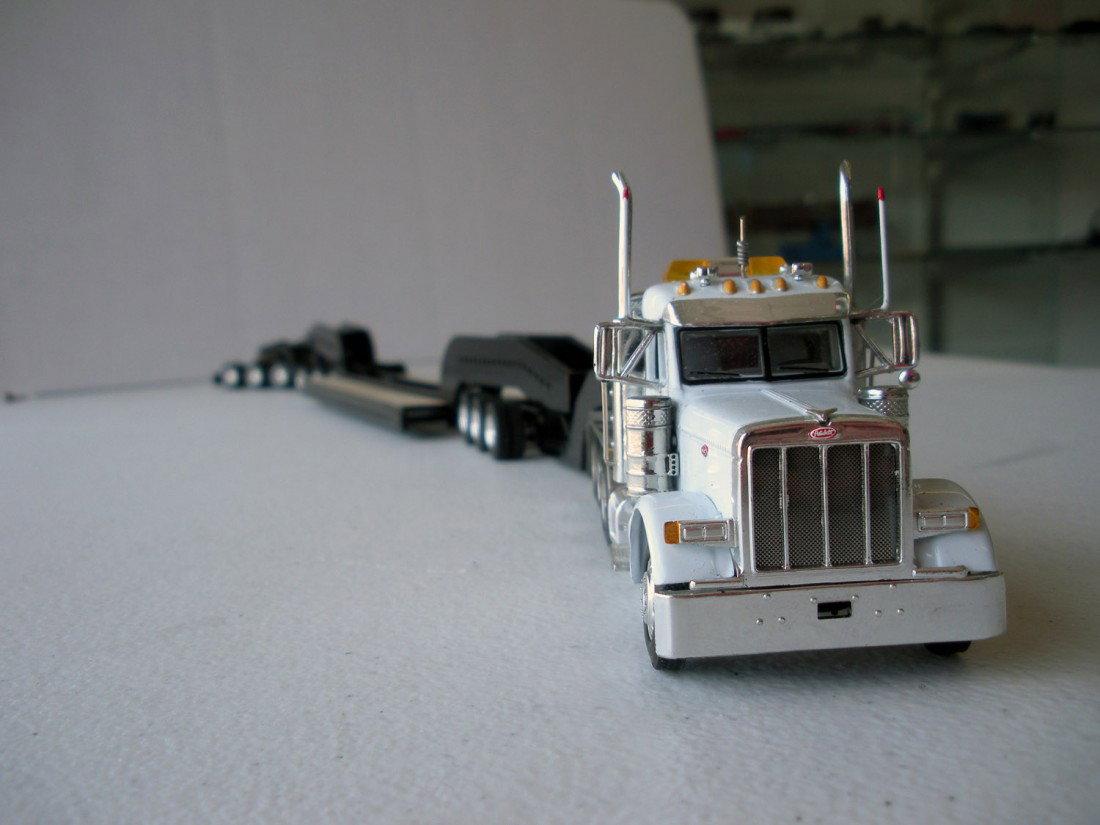 154: Peterbilt 4-Axle Tractor w/9-Axle Lowboy