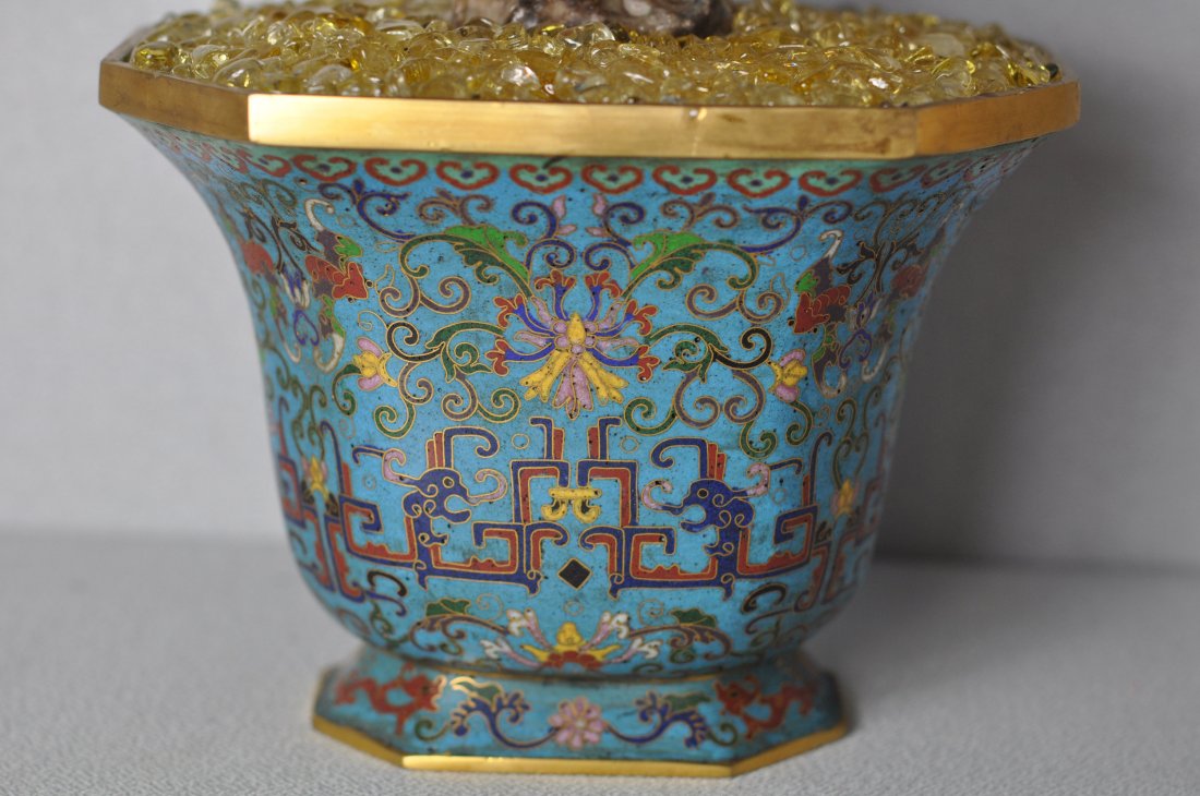 A CHINESE BURNT JADE SCULPTURE