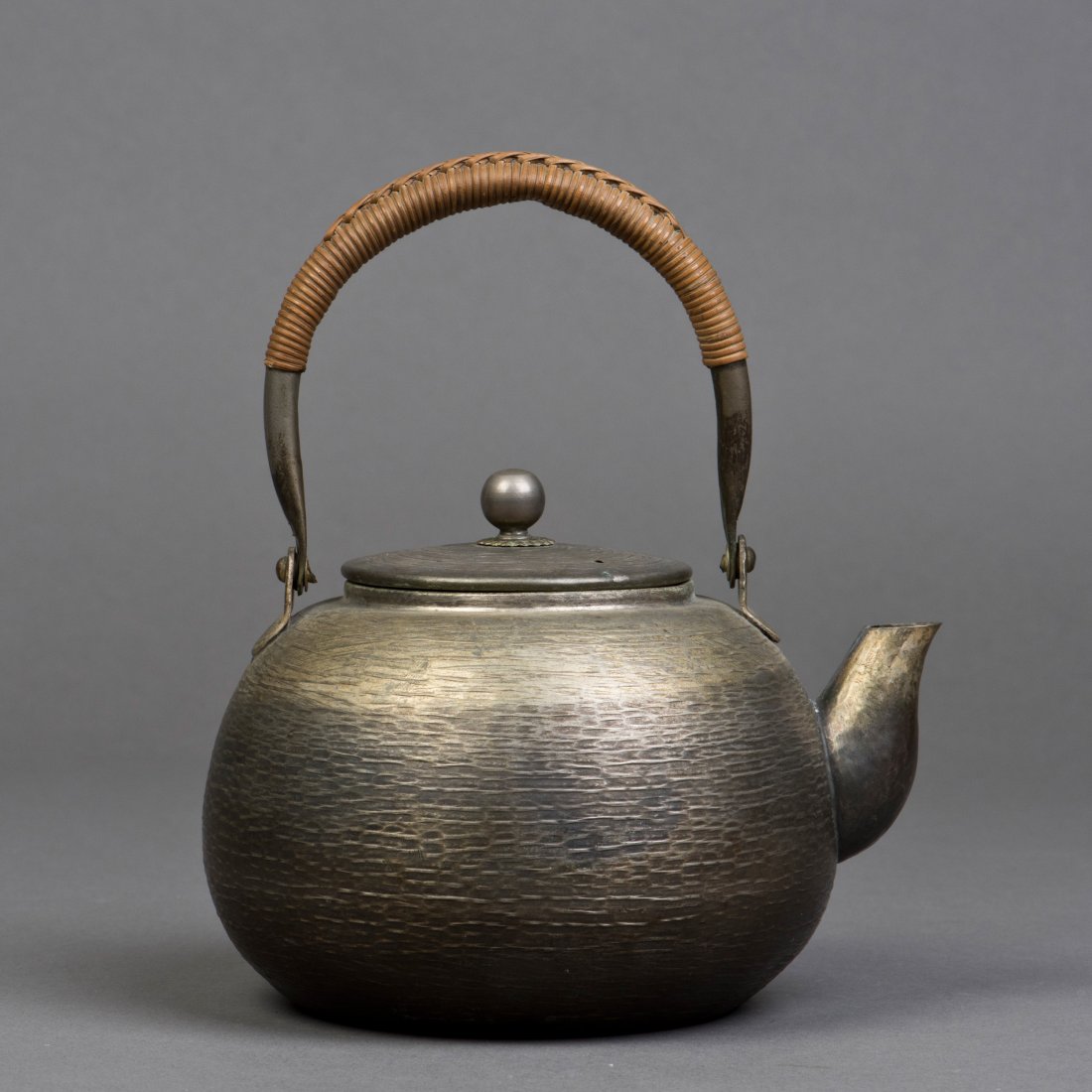 A JAPANESE SILVER TEAPOT