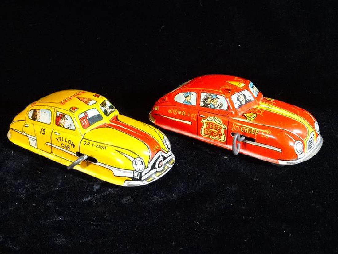 2 VINTAGE METAL WIND UP CARS, CIRCA 1950's, FIRE