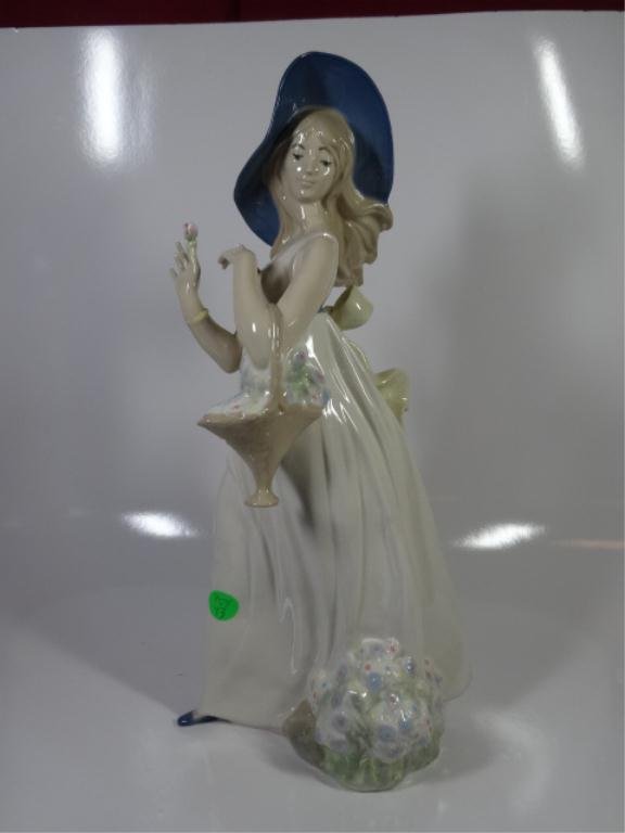 REX VALENCIA PORCELAIN FIGURINE, WOMAN WITH FLOWER,