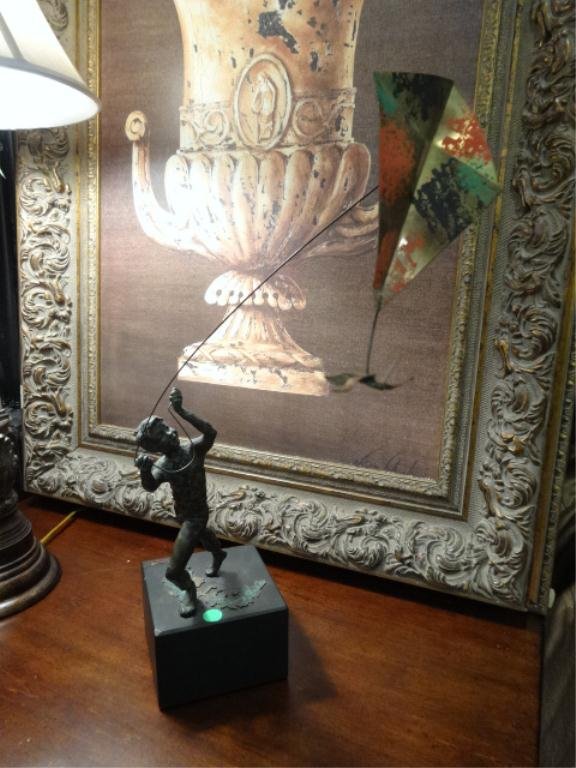 CURTIS JERE SCULPTURE, BOY FLYING A KITE, CIRCA 1968,