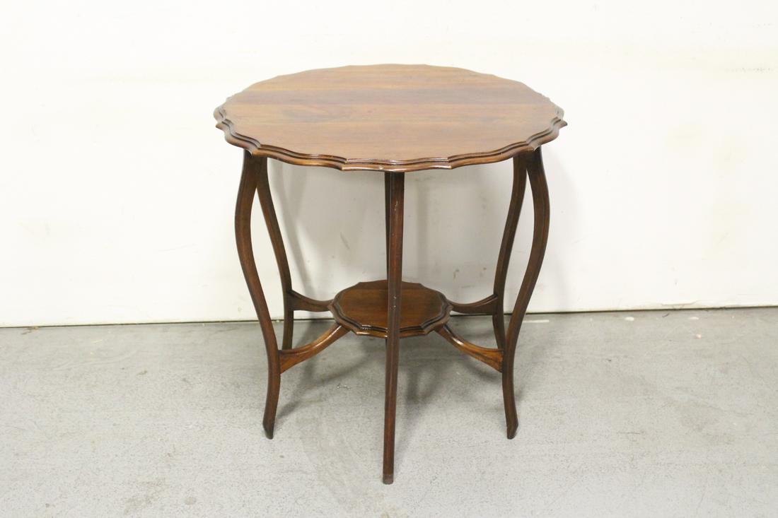 A Very Fancy Mahogany 6 Legged Parlor Table