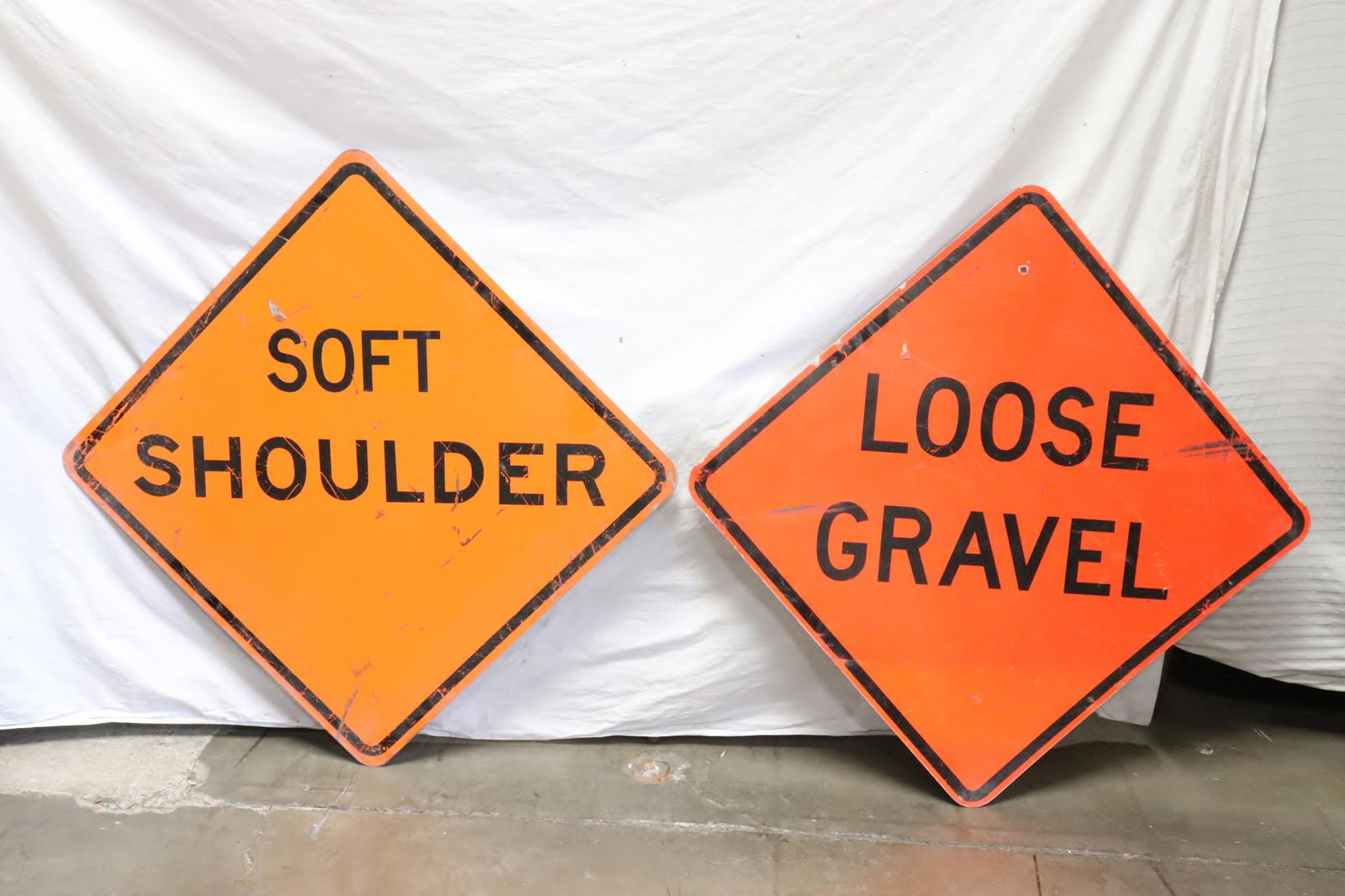 2 Large Traffic Signs; "loose Gravel" And "soft Shoulder"