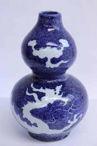 A White On Blue Gourd Shape Vase