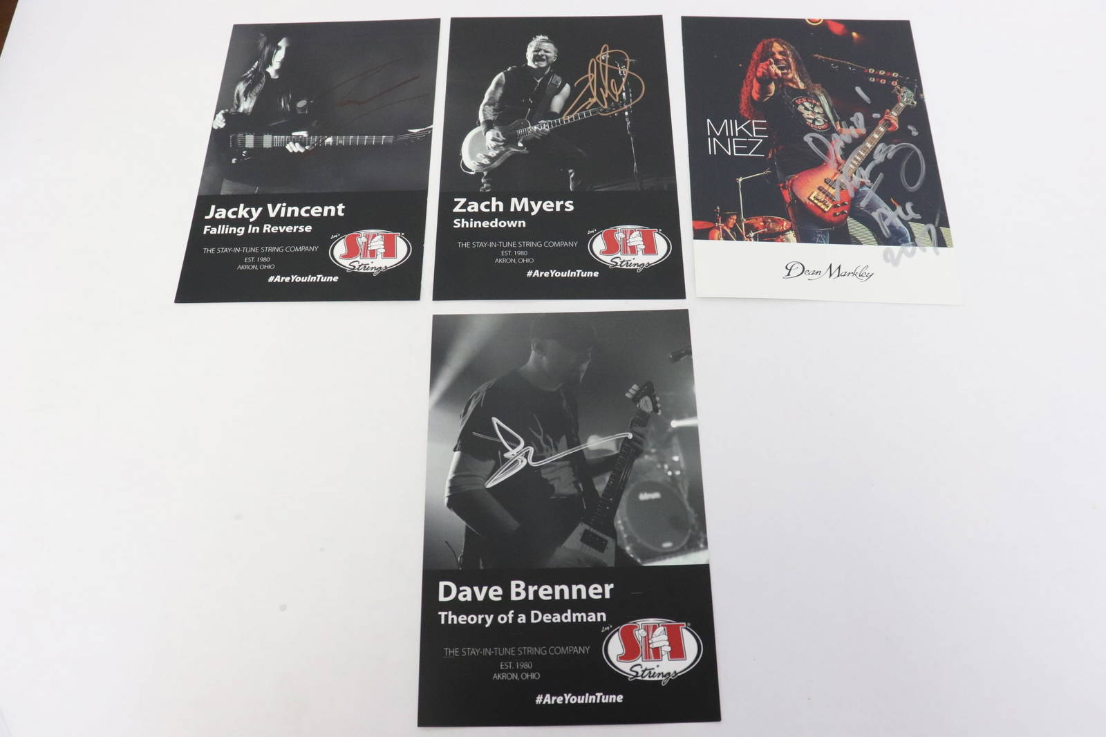 4 Signed Photos Of Rock Band Members Auction