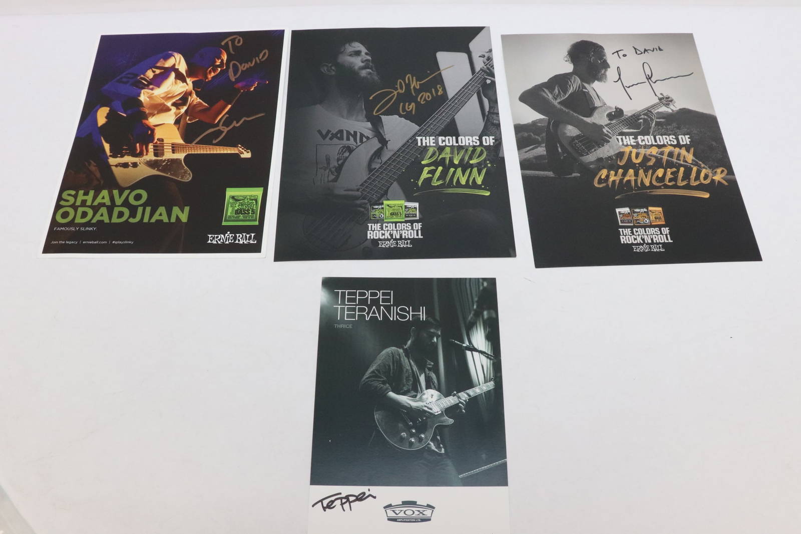 4 Signed Rock Band Member Photos Auction