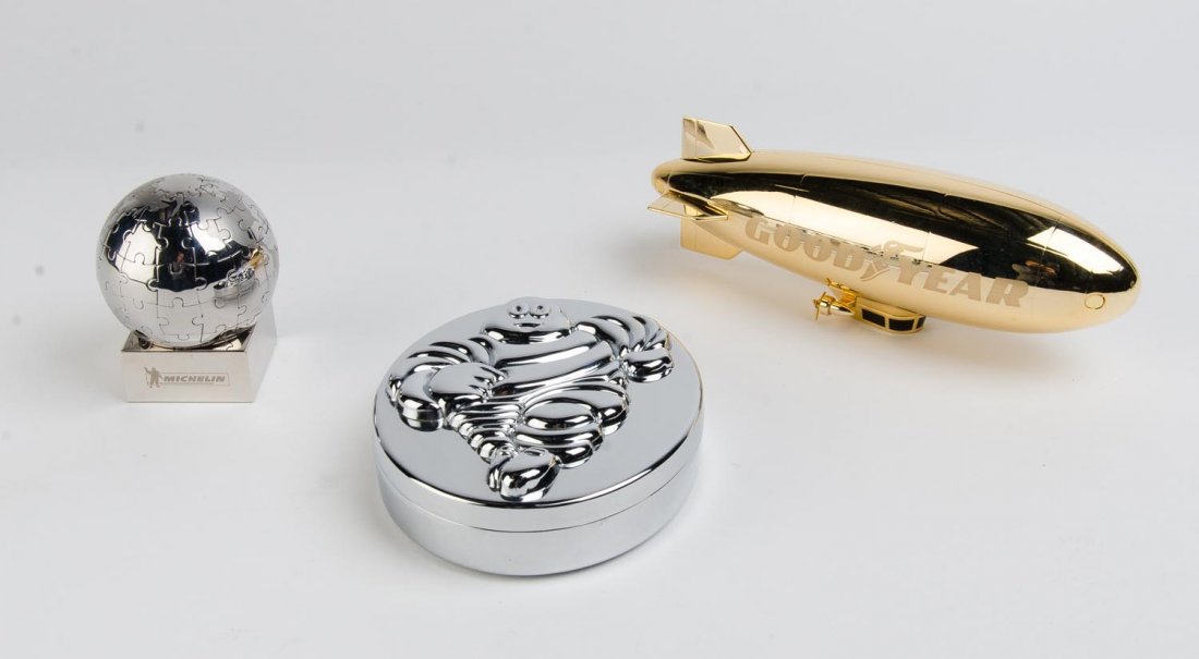 MICHELIN: A 24K gold plated Goodyear Blimp money bank
