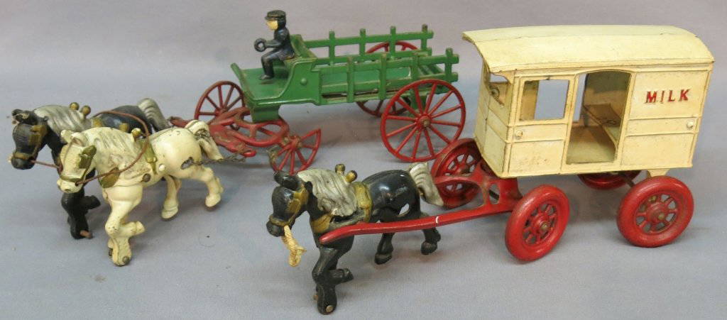 Two Cast Iron Toy Horse Drawn Wagons