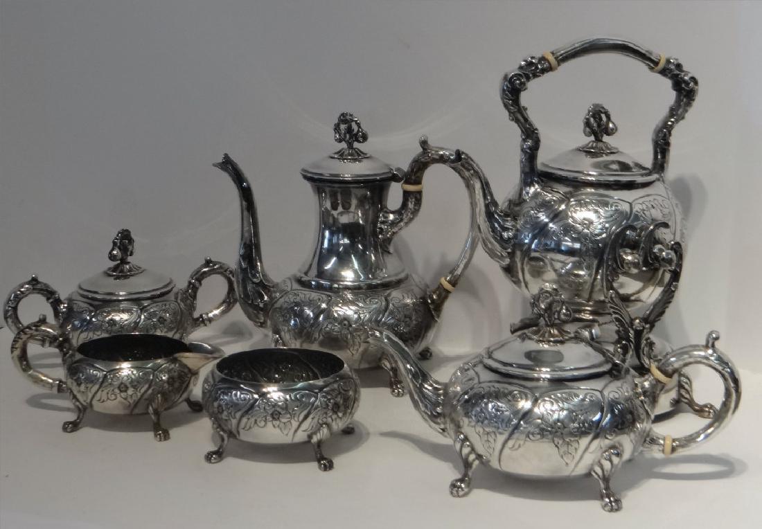 Stieff sterling silver full hand chased tea set
