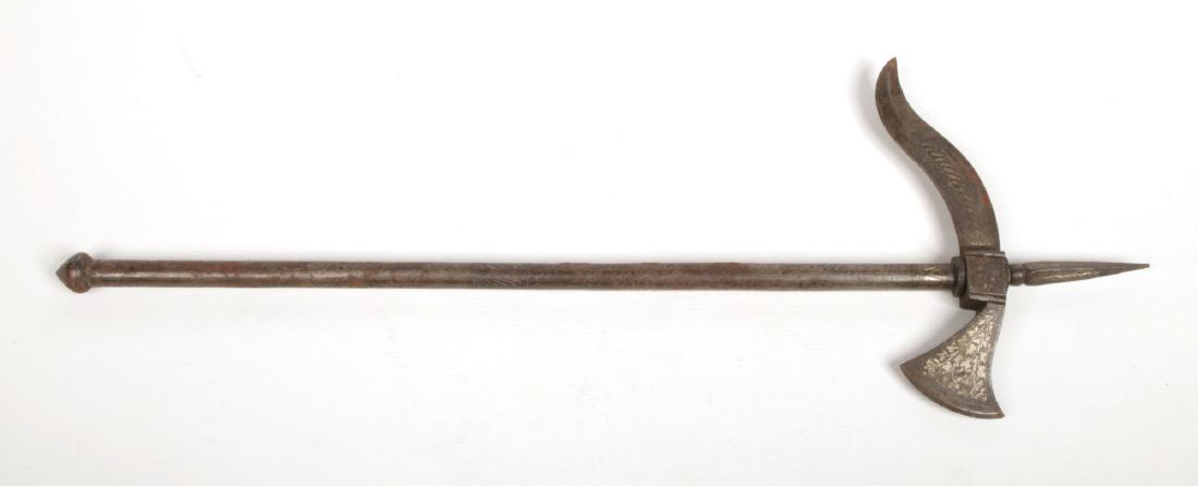 A 19th century Indian hand axe. With niello scrollwork