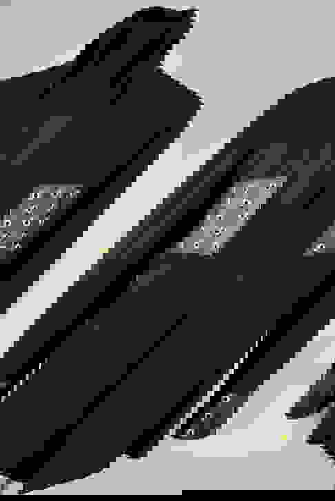 Elvis Presley's Custom Bill Belew Black Grommet Jacket Auction