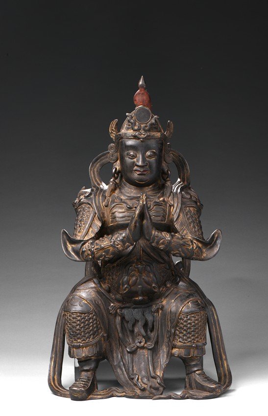 A LARGE PARCEL-GILT BRONZE CAST WEITUO STATUE