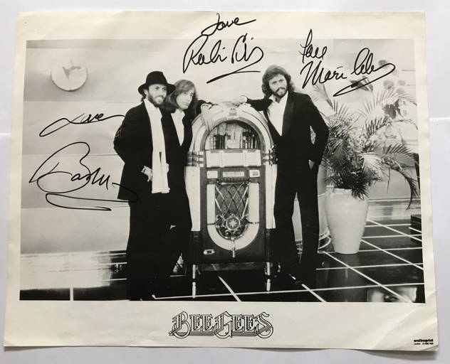 Bee Gees Signed 10 X 8 Inch B/w Magazine Page, Signed