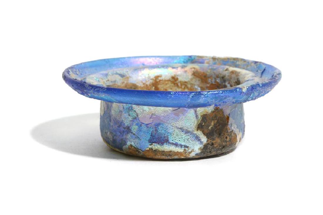 A ROMAN MINIATURE BRIGHT BLUE GLASS BOWL Circa 1st
