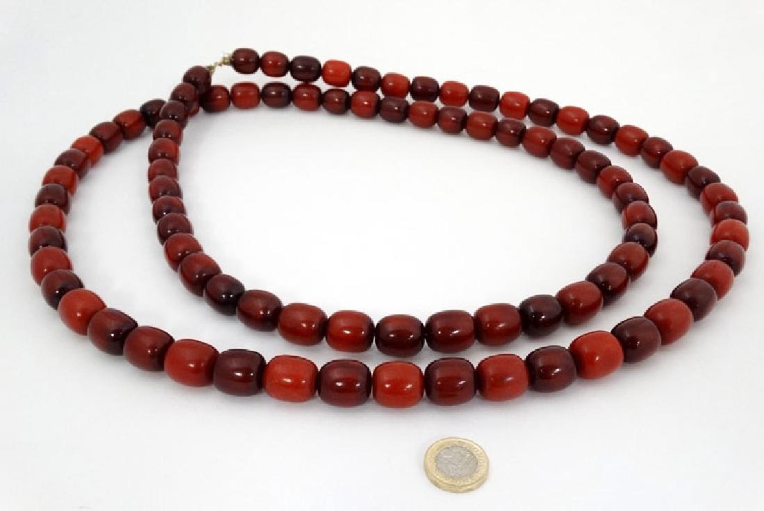 An exceptionally long string of cherry coloured - Aug 05, 2017 ...