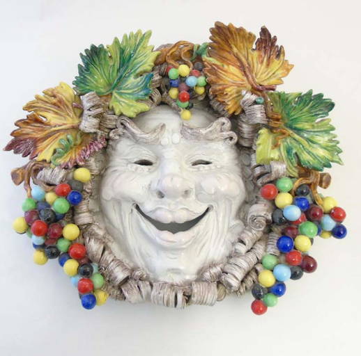 An Italian Majolica Bacchus Mask Wall Hanging In The