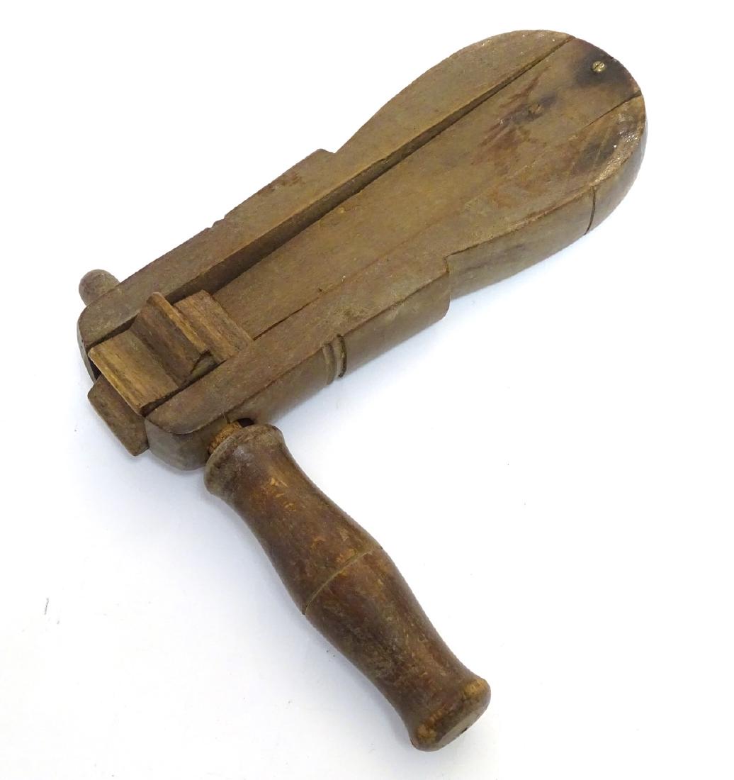 An old wooden football rattle / claxon . Approx 9''