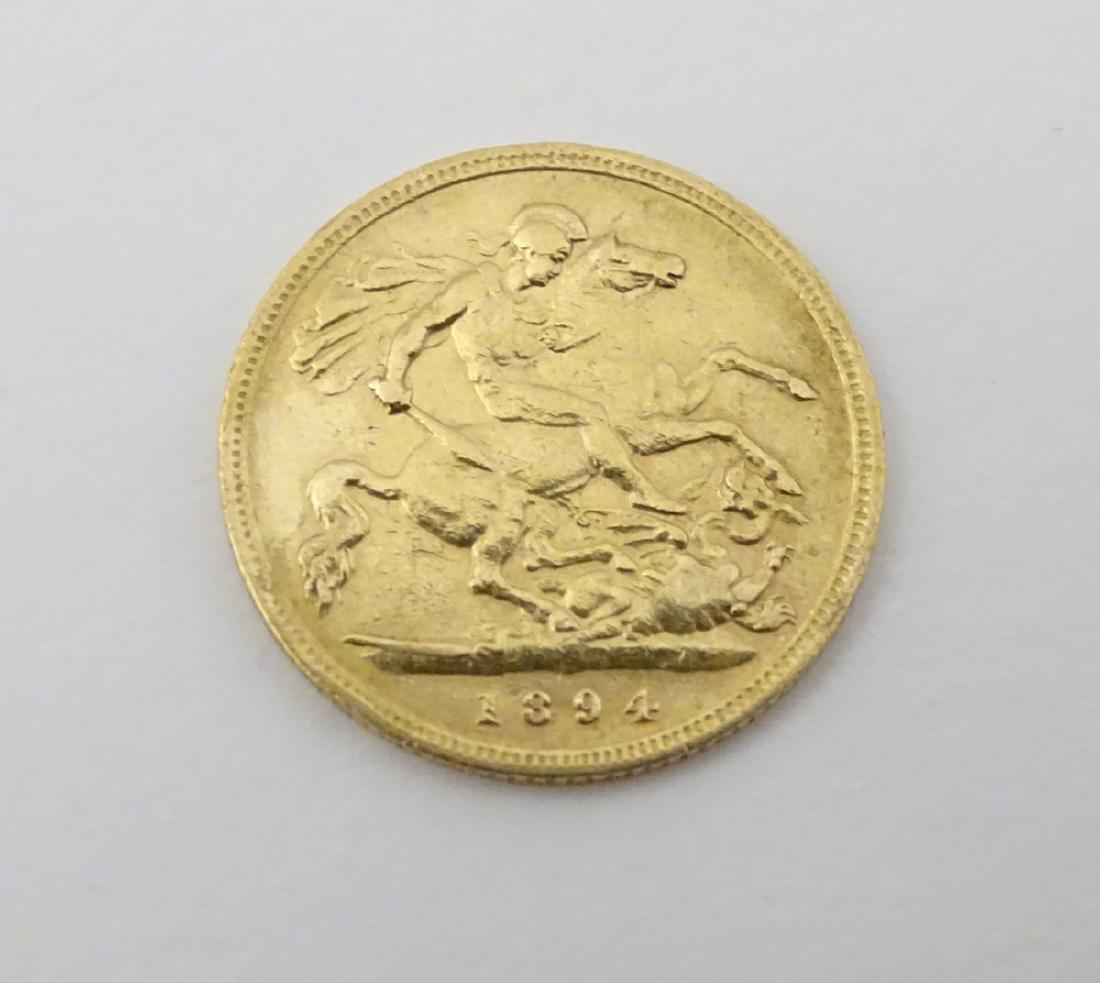 Coin : An 1894 gold half Sovereign (Victoria old head,
