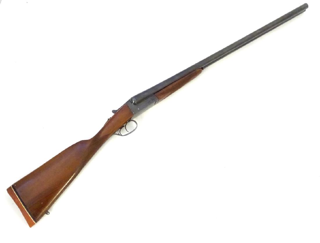 Shotgun: A 12 bore side by side boxlock shotgun by